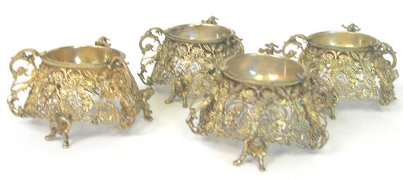 Bonhams : A set of four late 19th century German silver-gilt salt ...