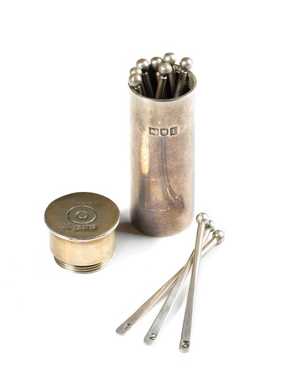 Bonhams : A silver cartridge place-finder