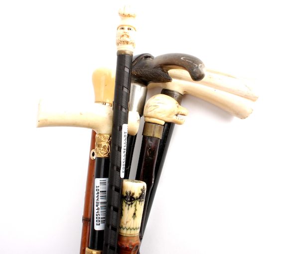 Bonhams : Six ivory handled canes and a cane with carved horn handle