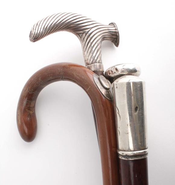 Bonhams Three Silver Handled Canes And A Silver Mounted Cane
