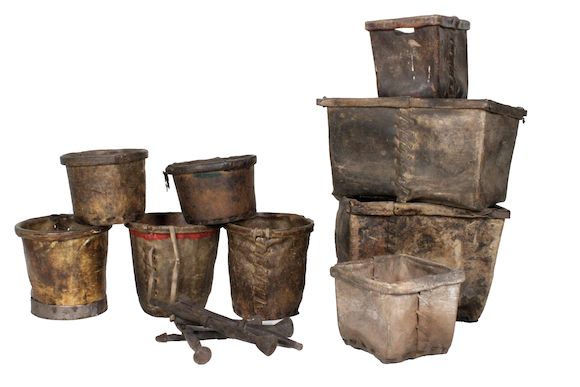 Bonhams : A group of nine old hide tubs