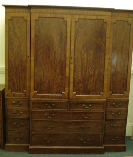 Bonhams : A George III mahogany breakfront wardrobe, with moulded ...