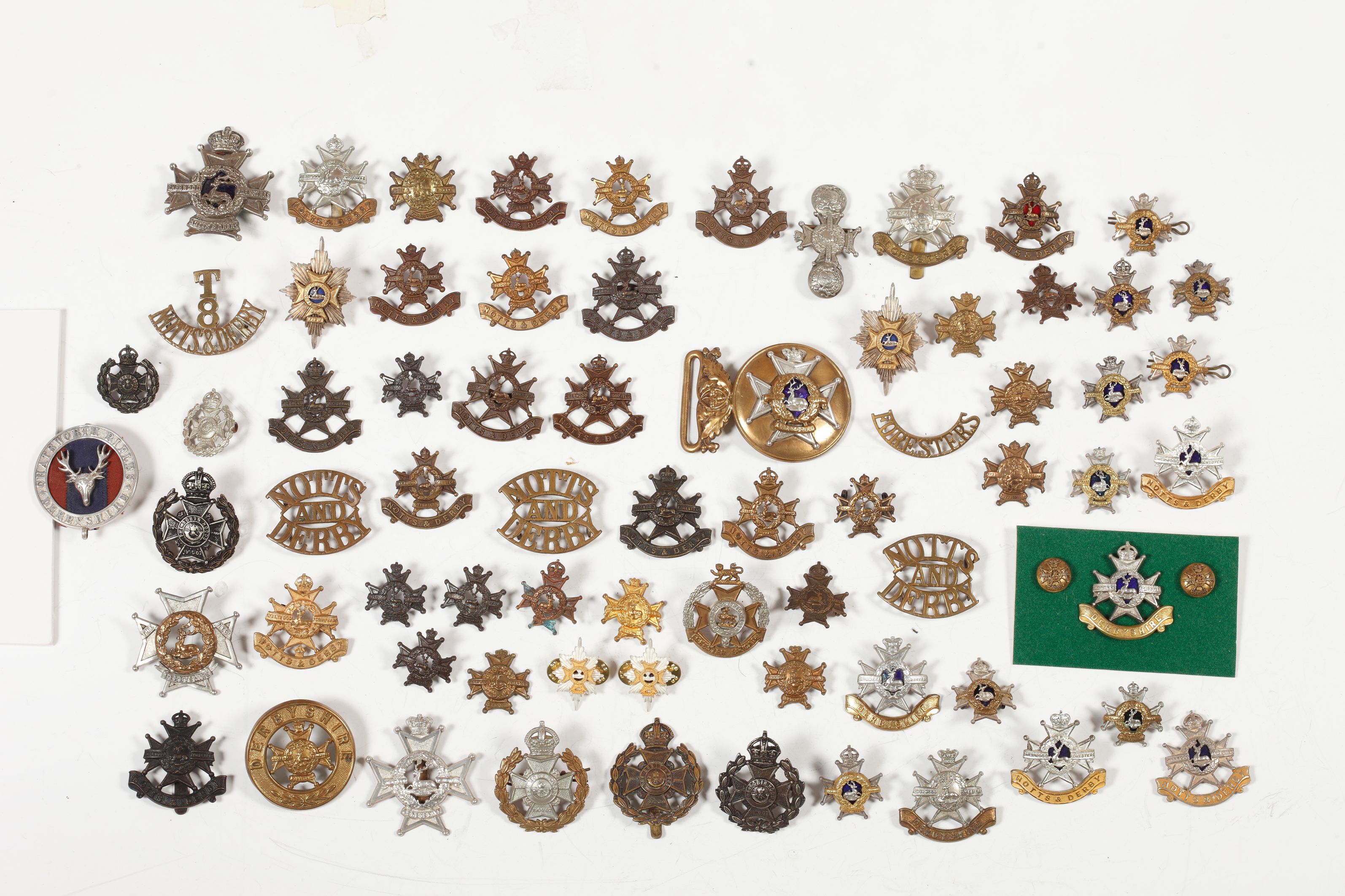 Bonhams : The Derbyshire Regiment & Notts and Derby Regimental Insignia.