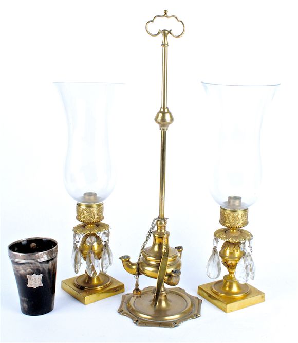 Bonhams : A pair of Victorian brass and lustre storm lamps