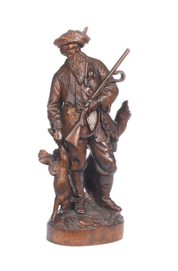 Bonhams : A late 19th century Swiss Black Forest carved wood figure of ...