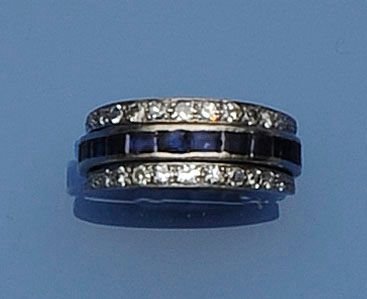 Bonhams : A ruby, sapphire and diamond swivel eternity ring