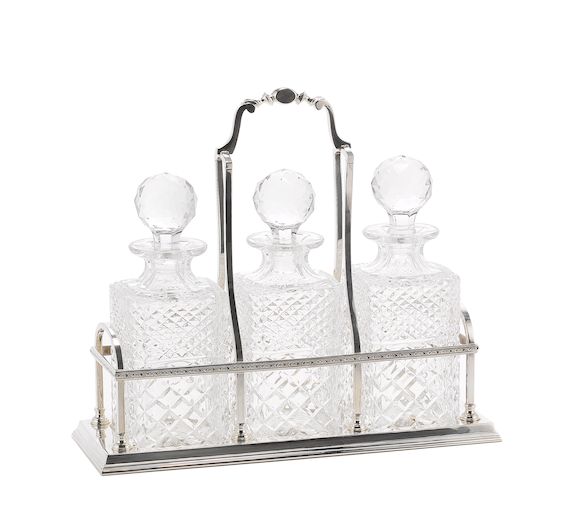 Bonhams : A modern silver three-bottle tantalus, by CJ Vander Ltd ...