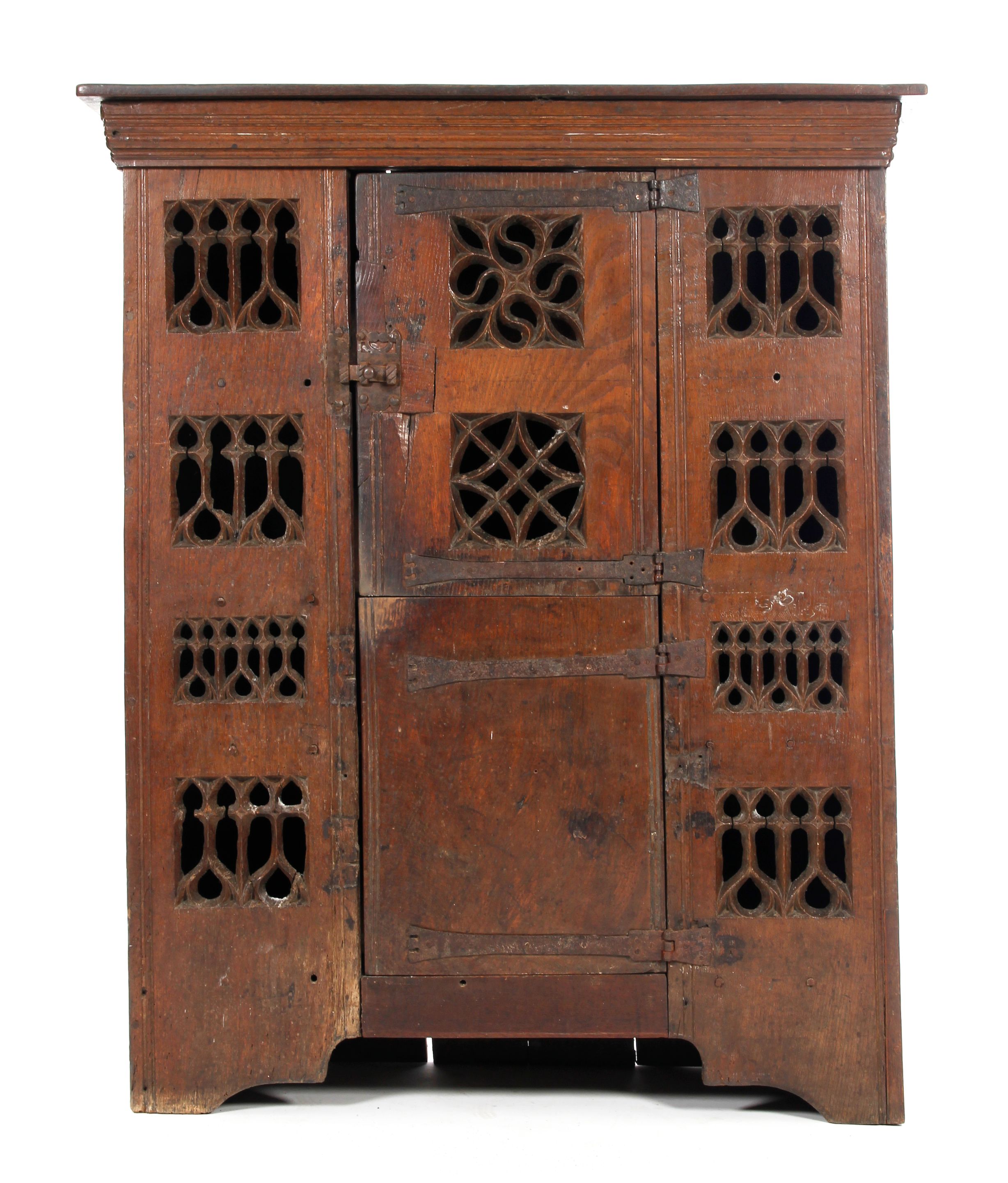 Bonhams : An oak aumbry In the late 15th century Gothic manner