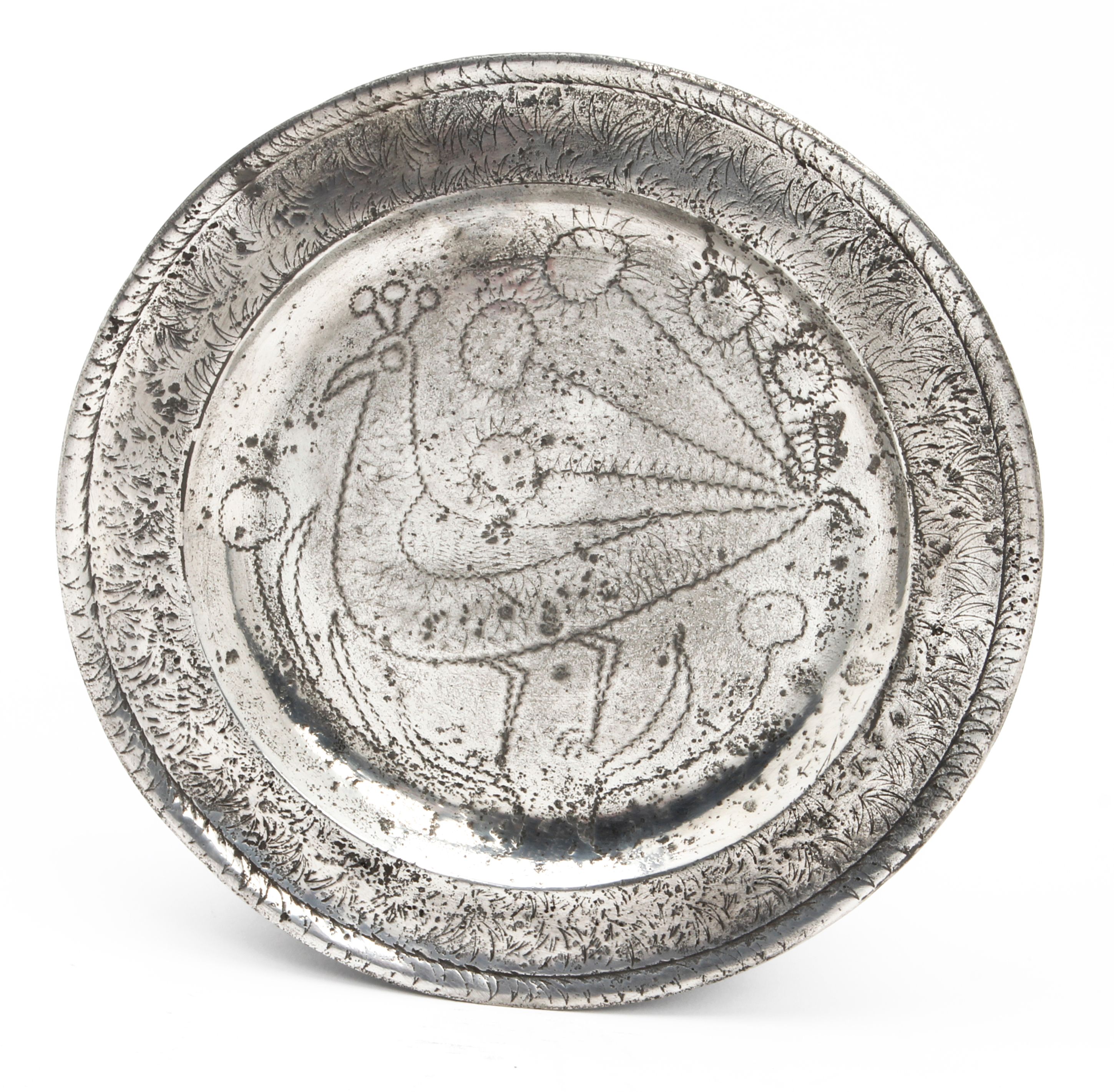 Bonhams : An early 18th century wriggle-work plate, circa 1710