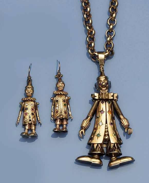 Bonhams : A 9ct gold articulated clown pendant