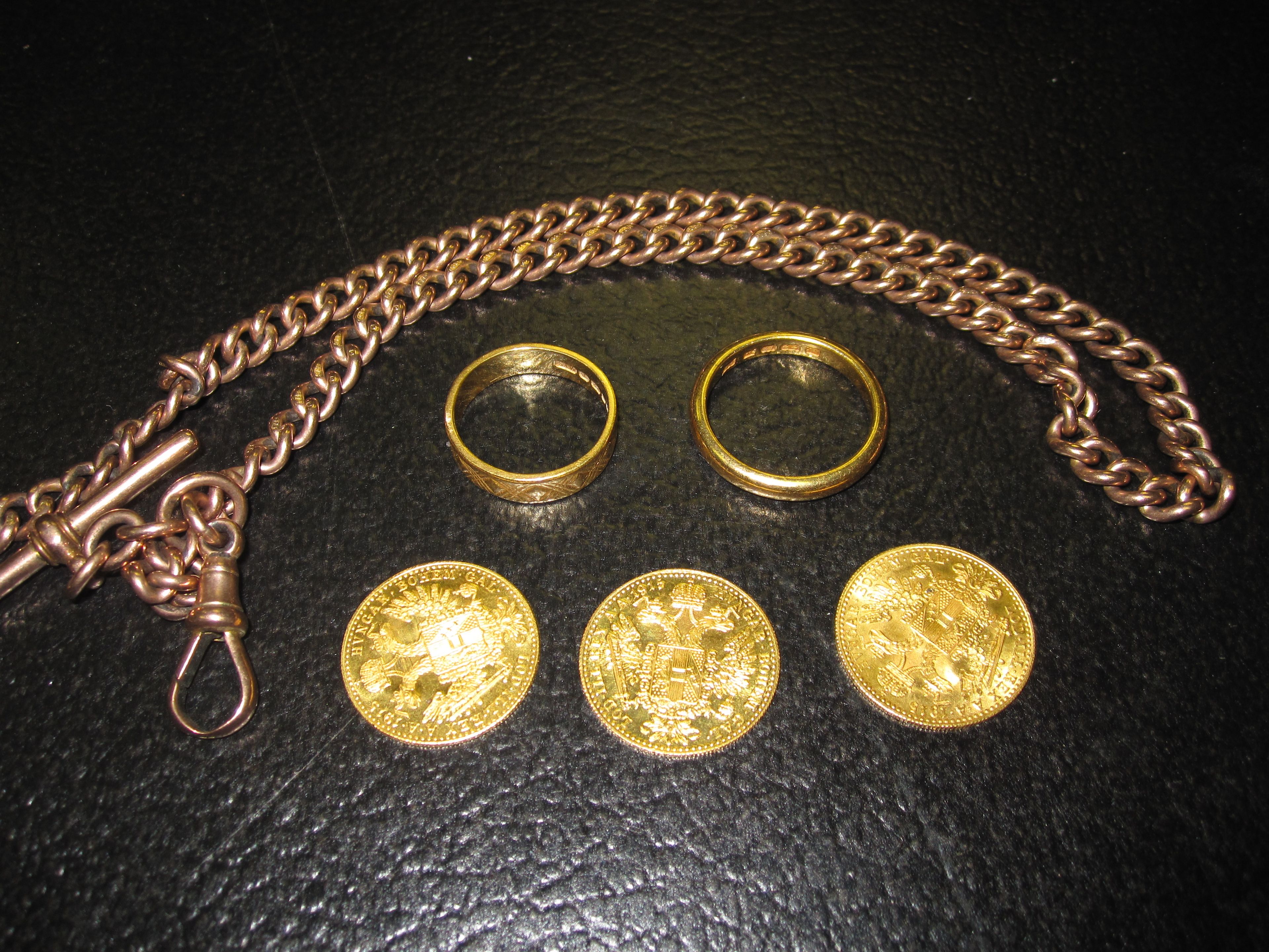 Bonhams : A 9ct gold curb-link Albert chain With swivel and ring bolt ...