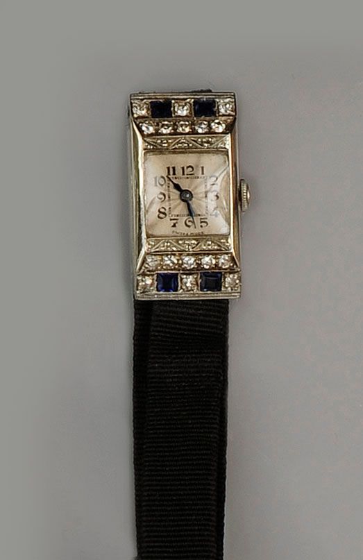 Bonhams : An 18ct white gold diamond and sapphire cocktail watch, circa ...