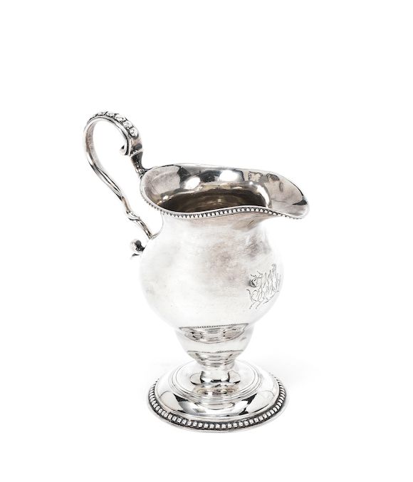 Bonhams : A mid 18th century Provincial silver cream jug, stamped 'T.P ...