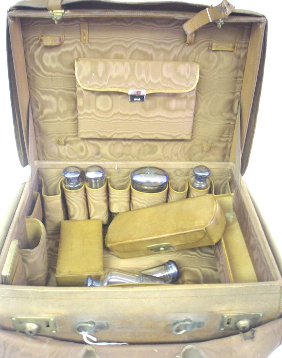 Bonhams : A Victorian leather travelling suitcase with silver fittings ...