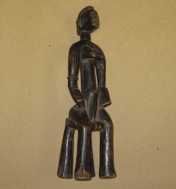 Bonhams : A Senufo sandobele divination figure, Ivory Coast, 24cm high