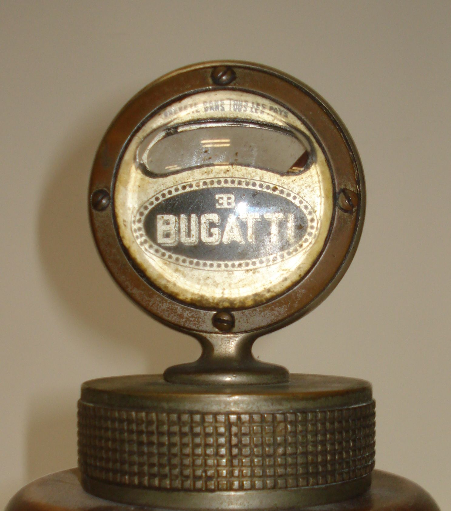 Bonhams Cars : A Bugatti radiator cap with calormeter,