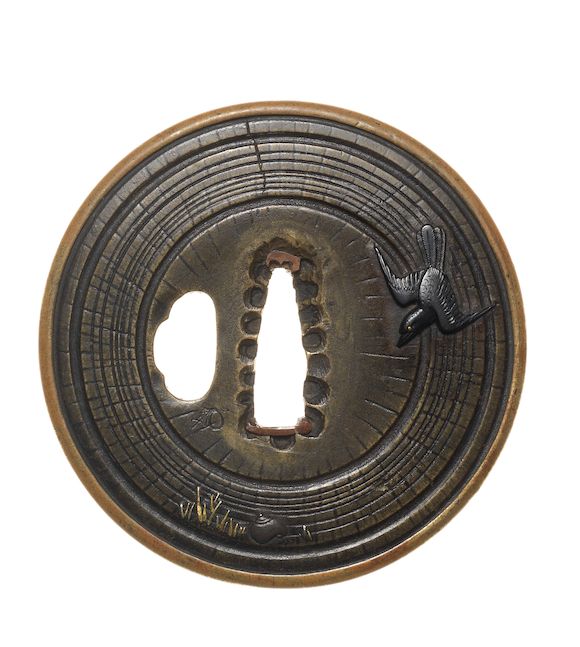 Bonhams : A sentoku tsuba Attributed to Hirata Hikozo I, 17th century