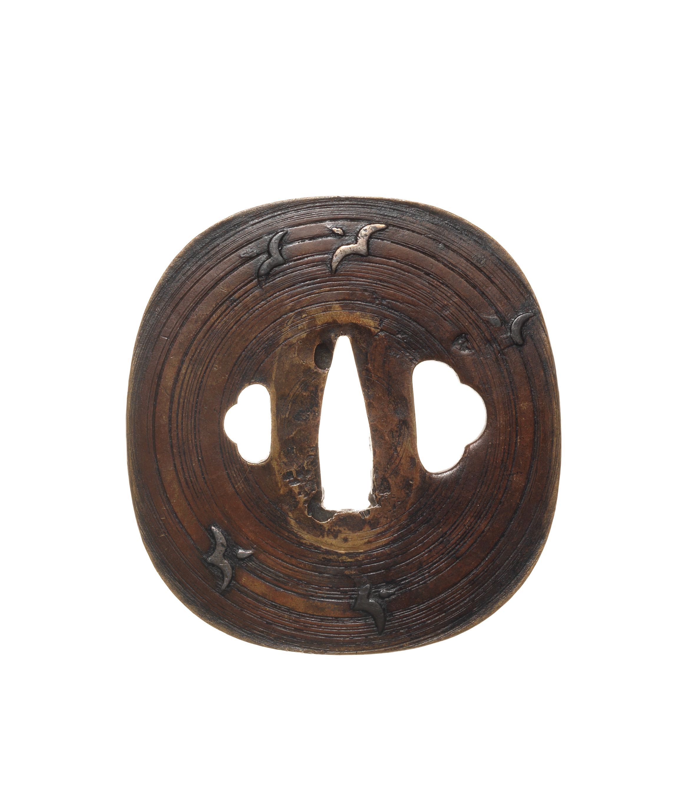 Bonhams : A copper tsuba Attributed to Hirata Hikozo I, 17th century