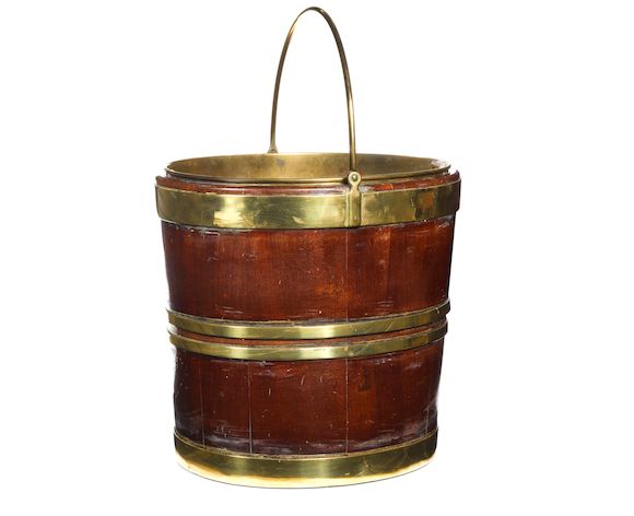 Bonhams : A Regency Irish mahogany, brass bound peat bucket
