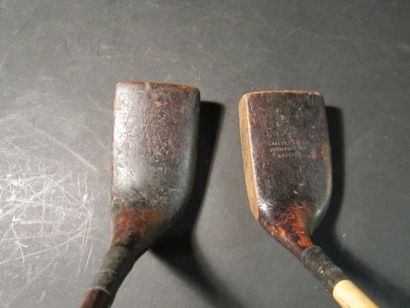 Bonhams : Two Gassiat style wooden headed putters