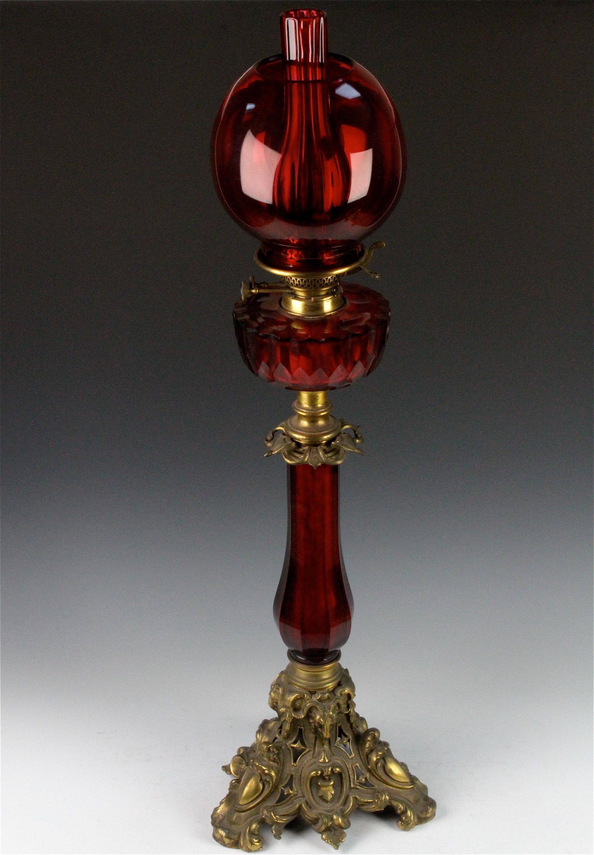 Bonhams : A good Victorian brass mounted & ruby glass oil lamp