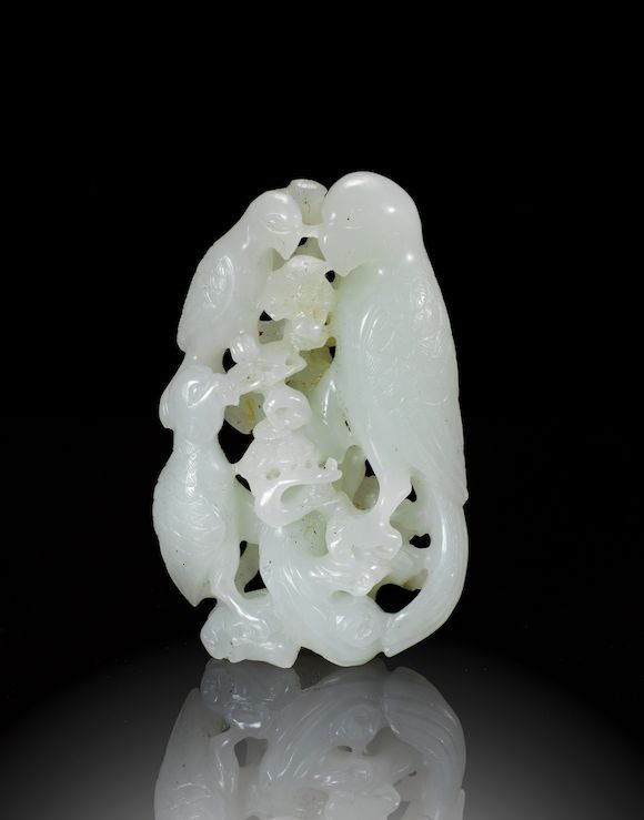 Bonhams : A reticulated jade pebble carving