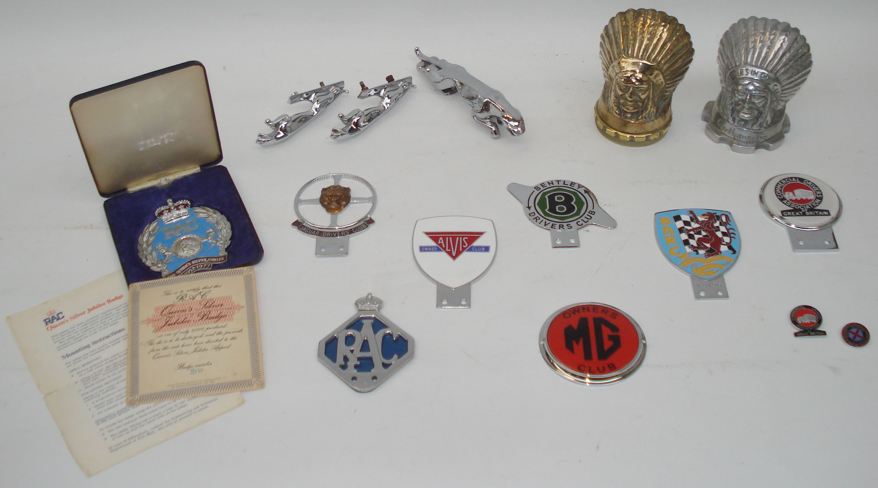 Bonhams Cars : A collection of radiator badges and car mascots,