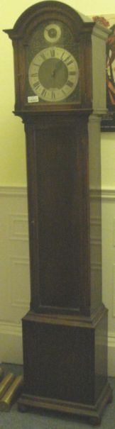 Bonhams : A 20th Century oak longcase clock, the broken arch dial with ...
