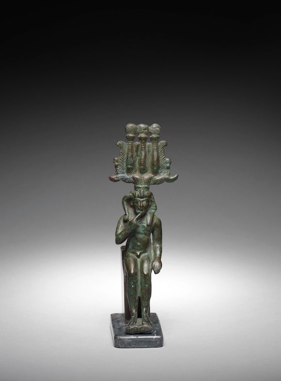 Bonhams : An Egyptian bronze figure of Harpocrates