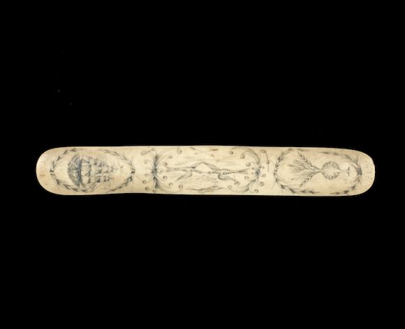 Bonhams : A 19th century decorated whalebone stay busk. 15ins. (38cm)long.