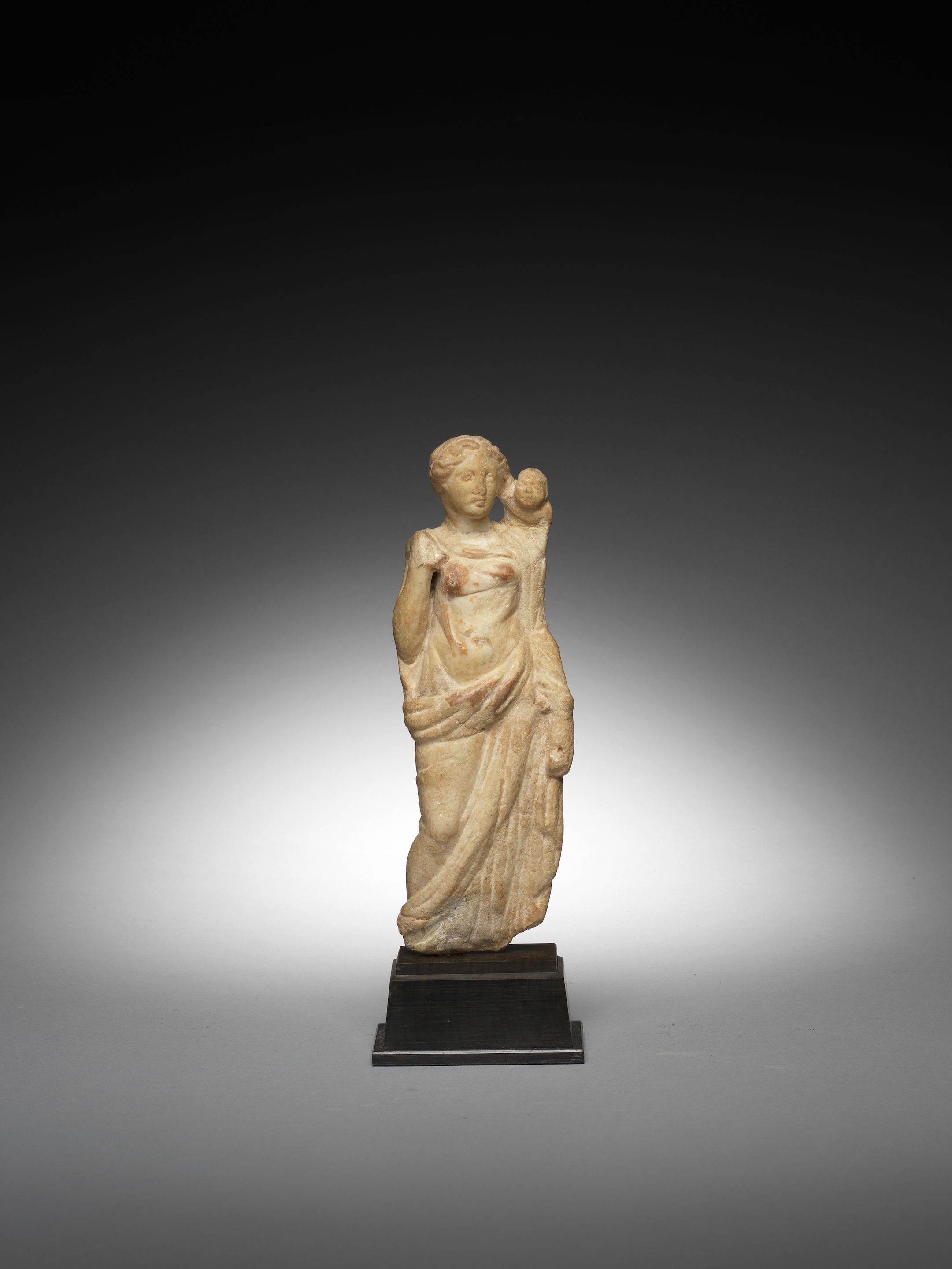 Bonhams : A Roman marble figure of Aphrodite with Cupid