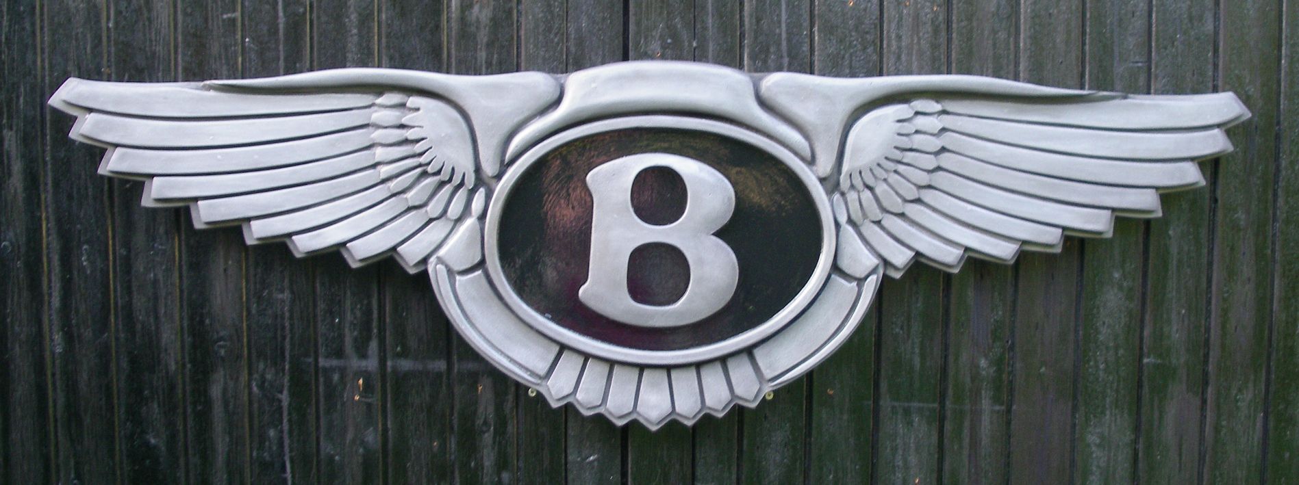 Bonhams Cars : A cold-cast aluminium Bentley emblem,