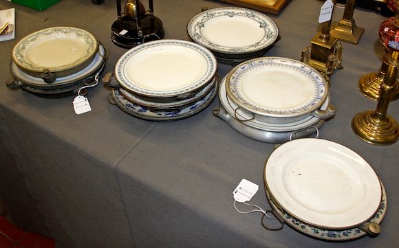 Bonhams : A group of eleven pewter mounted hot water dishes