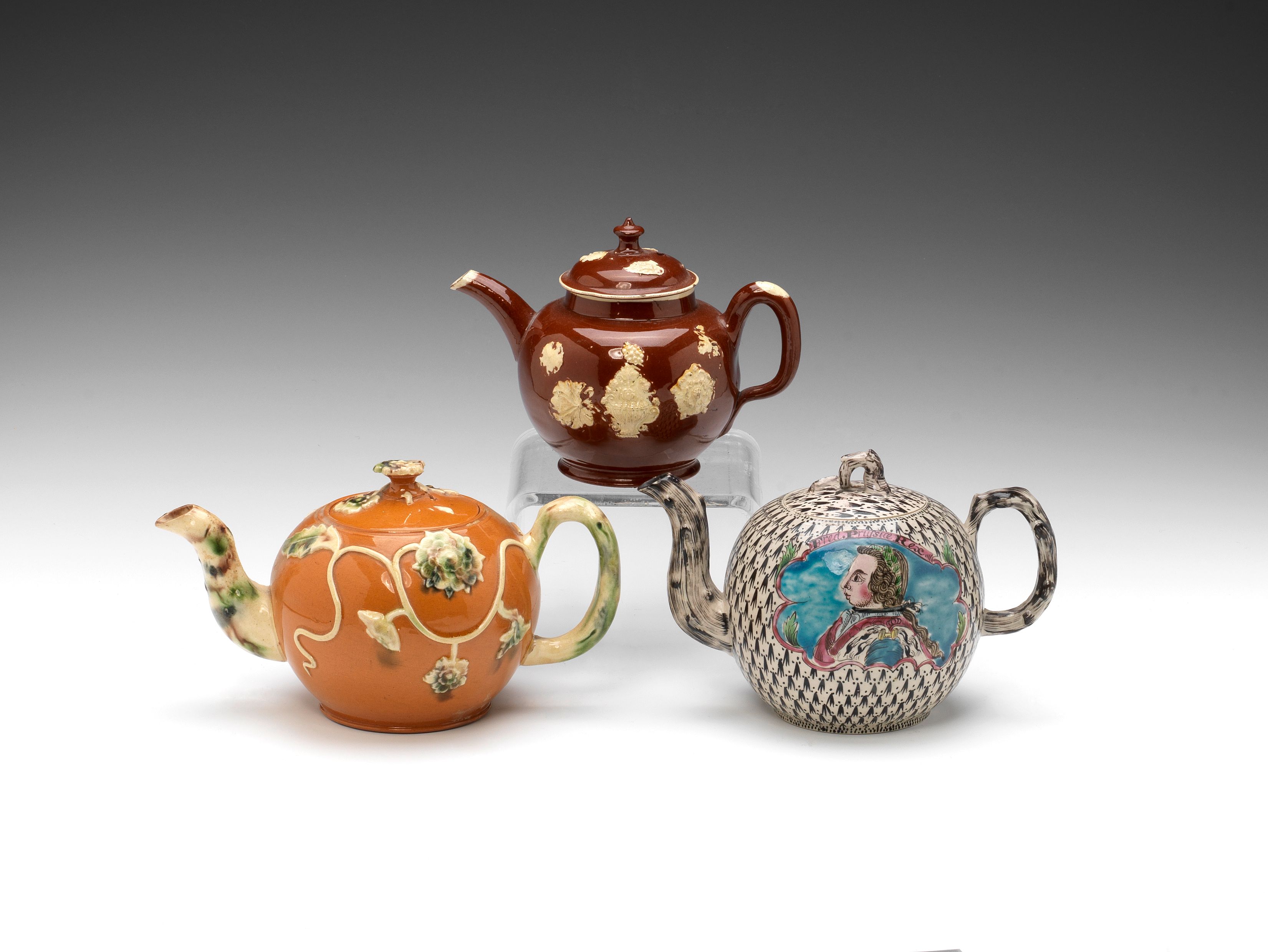 Bonhams : A Staffordshire ochre-coloured earthenware teapot and cover ...