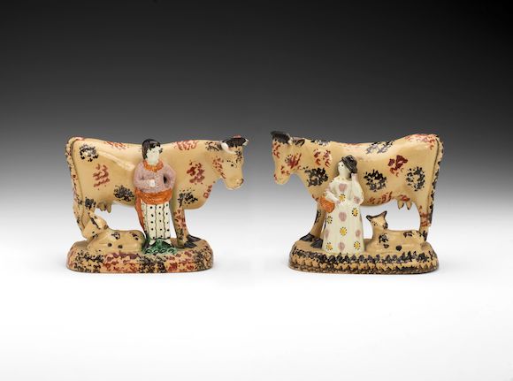 Bonhams : Two Yorkshire Pratt Ware cow and milkmaid groups, circa 1820