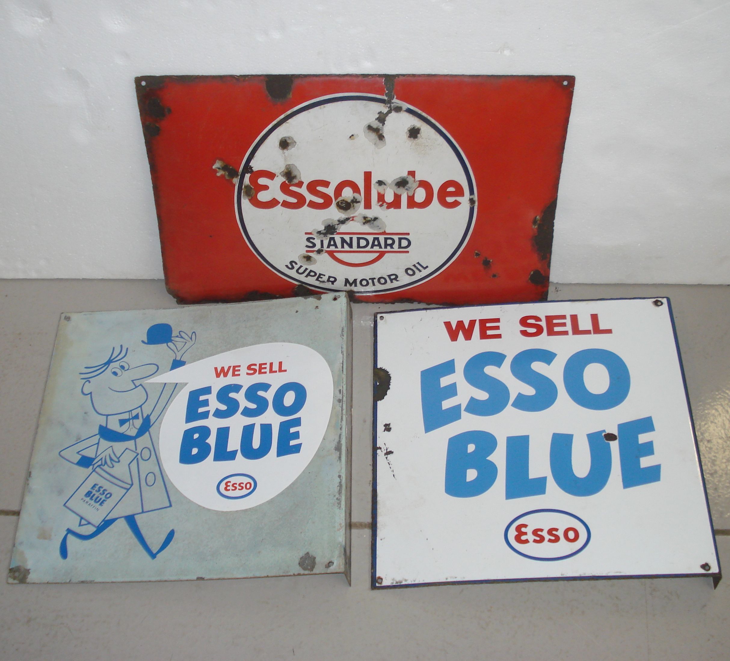 Bonhams Cars : Three Esso enamel advertising signs,