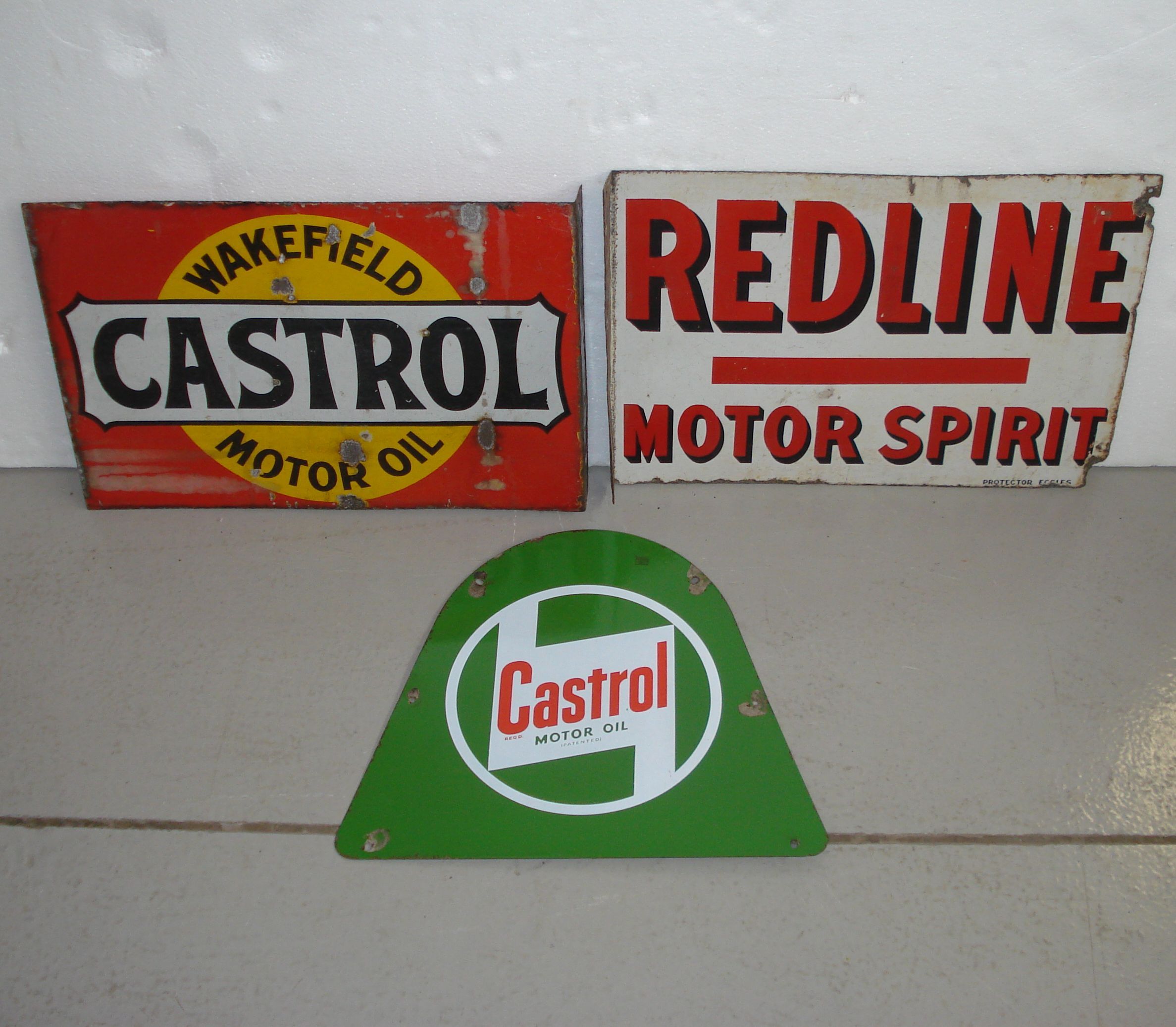Bonhams Cars : Three garage advertising signs for Castrol and Redline,