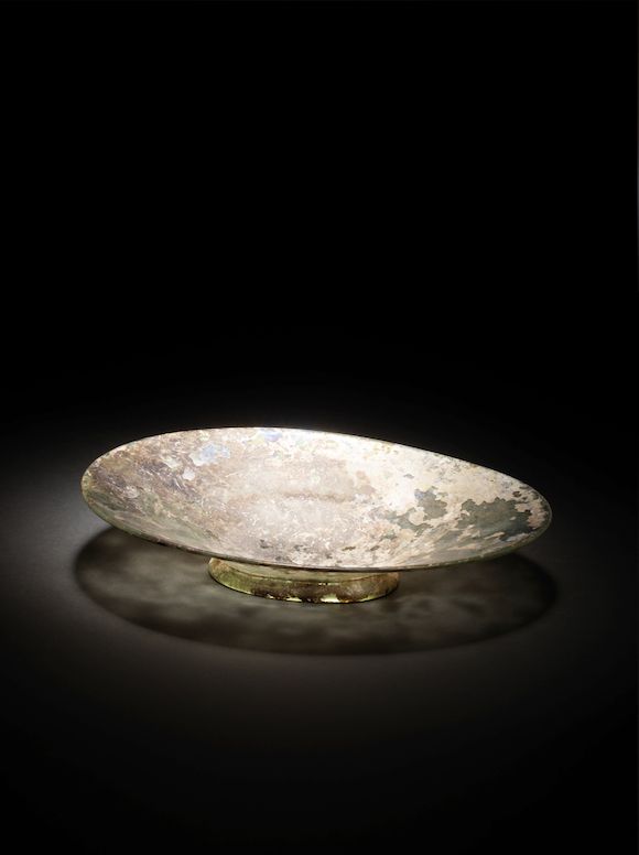 Bonhams : A Roman pale green glass oval dish