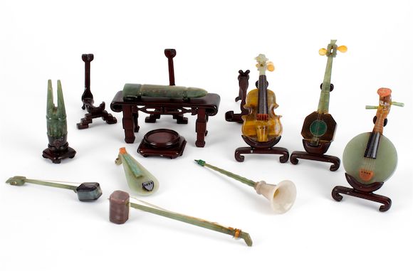 Bonhams : A group of jade or hardstone musical instruments