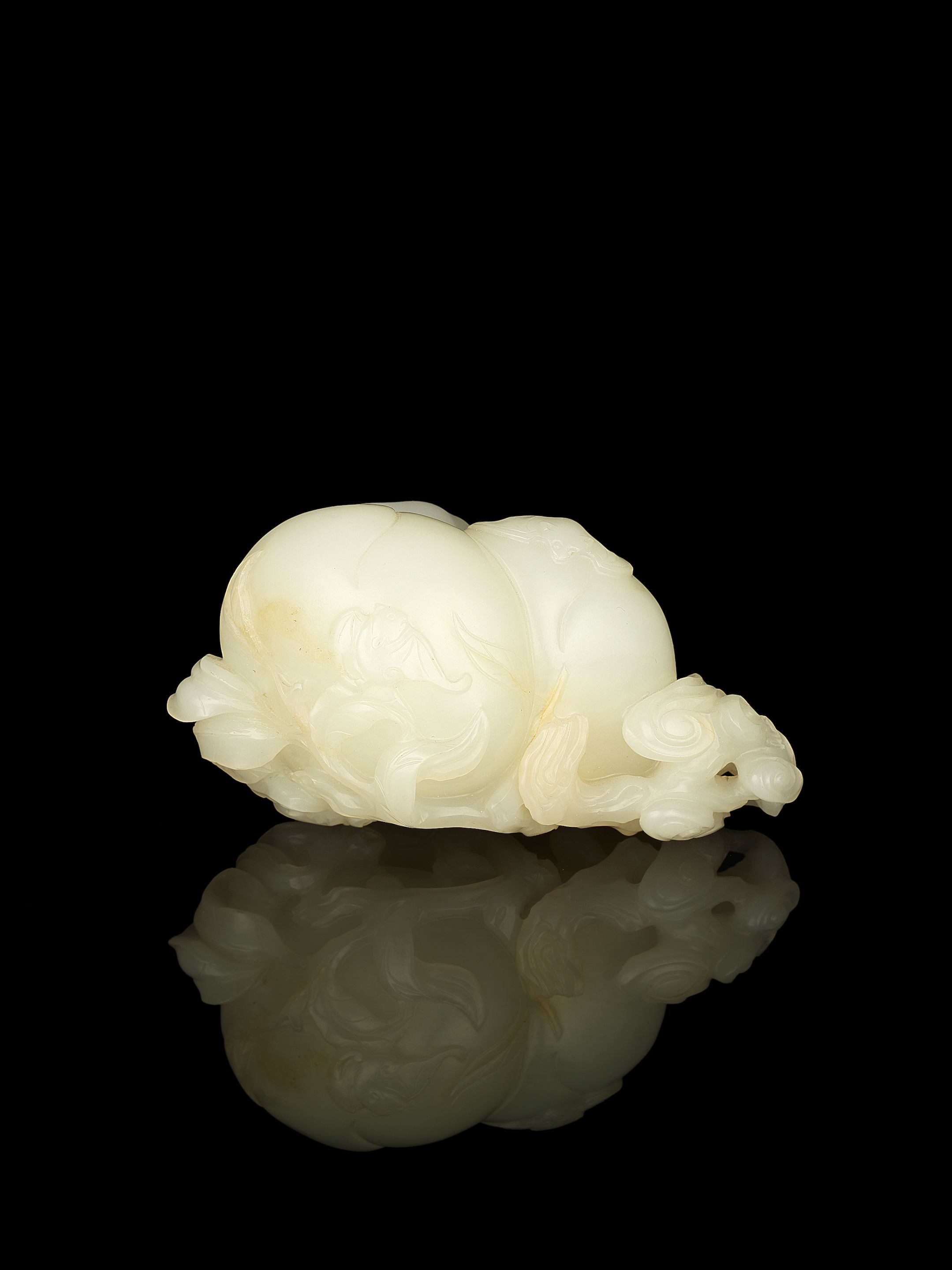 Bonhams : A white jade 'two peaches' group Qing dynasty