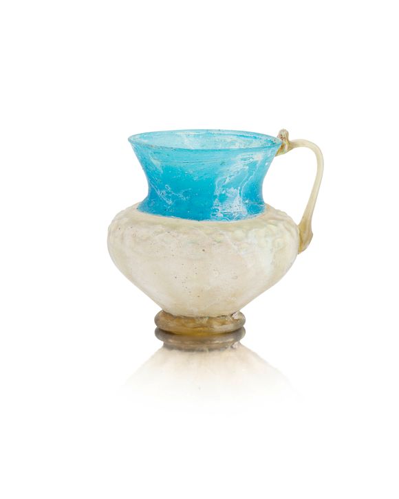 Bonhams : A small Persian two-colour glass jug 11th/12th century