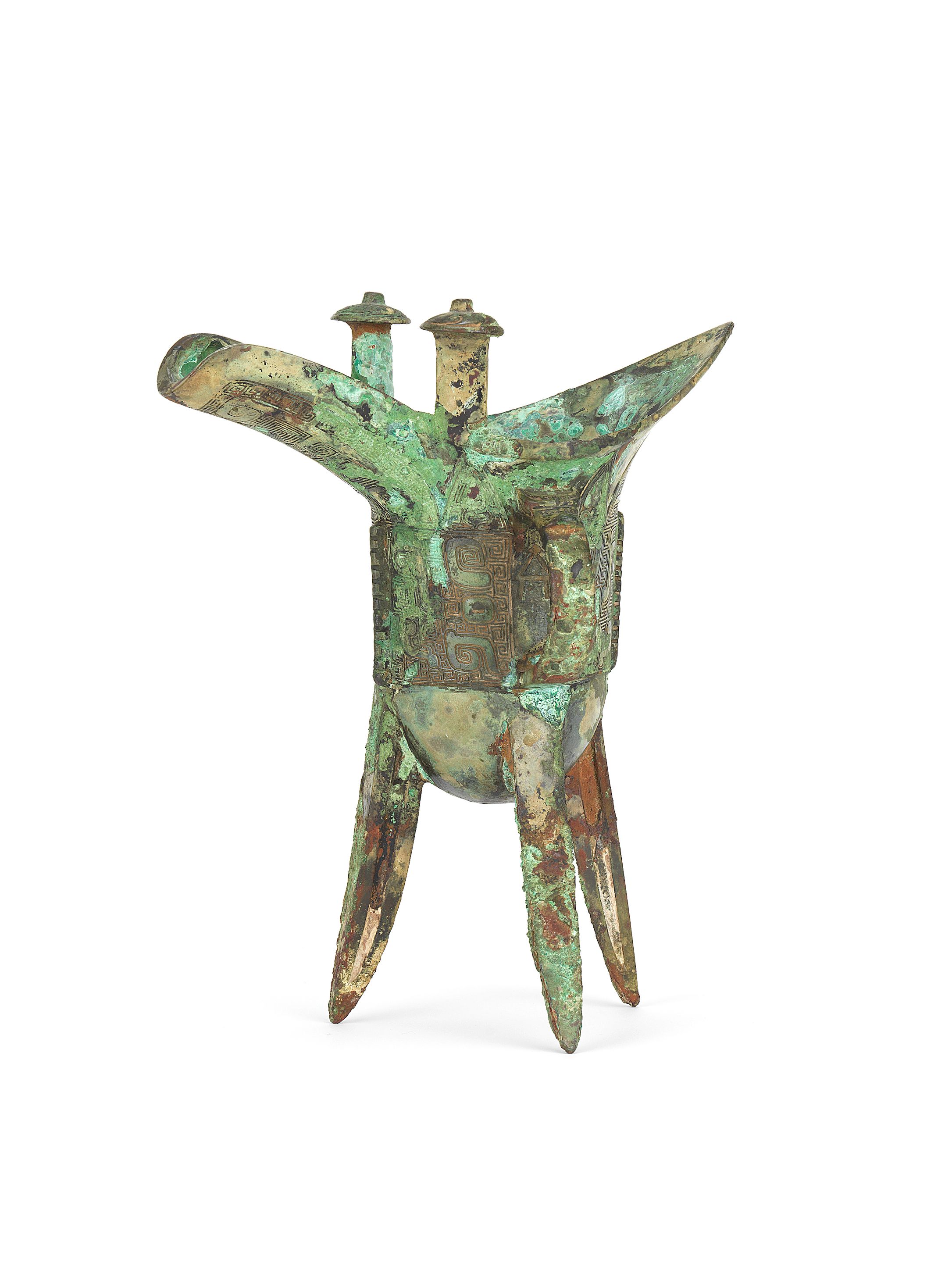 Bonhams : An archaic bronze tripod wine vessel, jue Late Shang/early ...