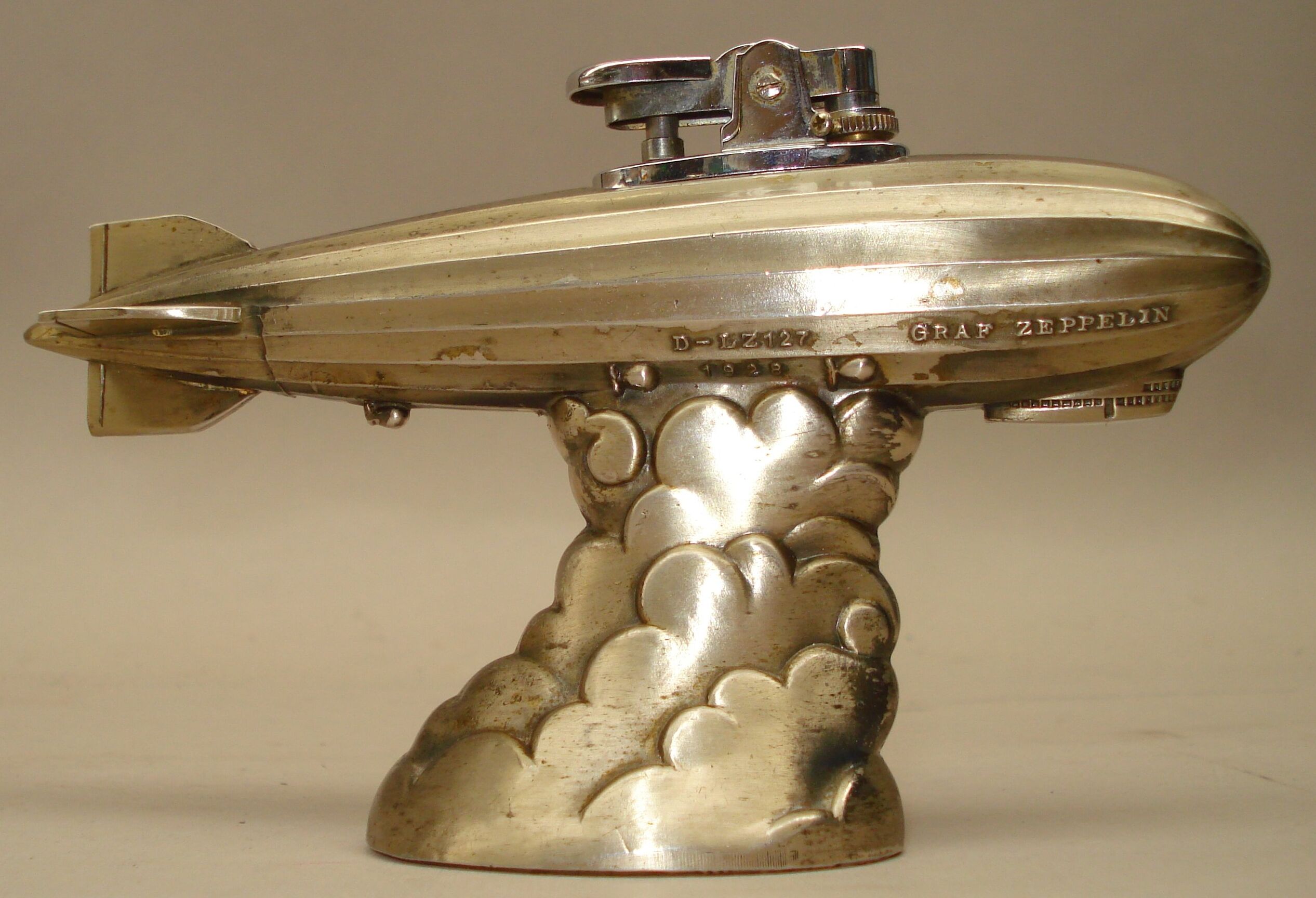 Bonhams Cars : A cigarette lighter mounted in the form of the airship ...