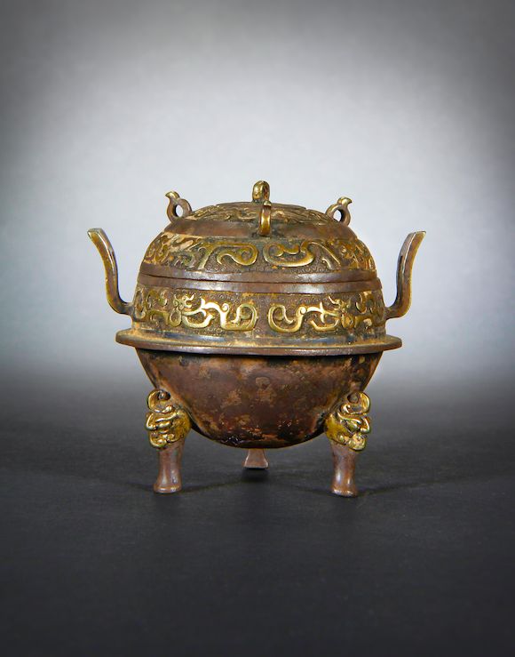 Bonhams : A small parcel-gilt and metal ding with domed cover