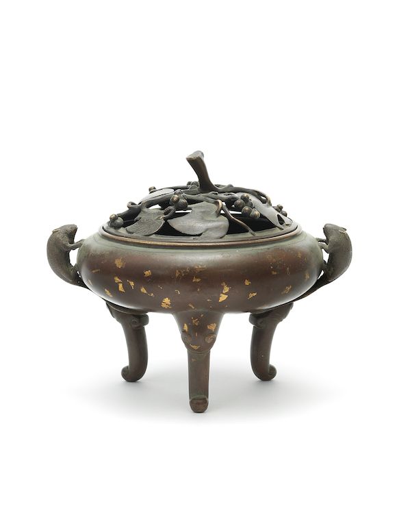 Bonhams : A gilt-splashed bronze 'tree shrew and grapevine' tripod ...