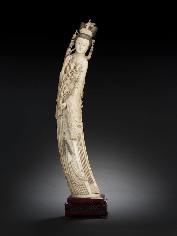 Bonhams : A large and impressive ivory figure of a lady Late 19th century
