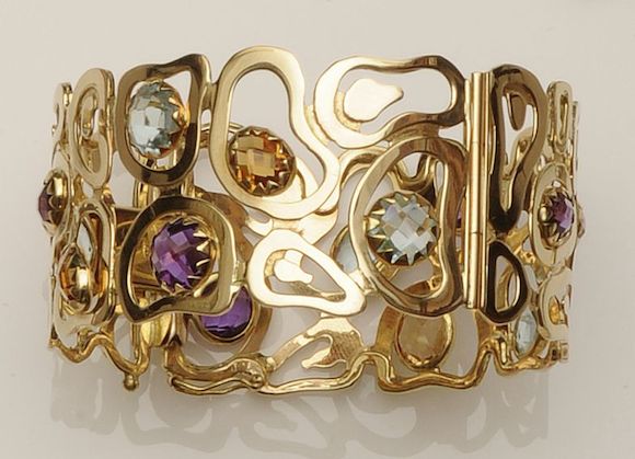 Bonhams : A vari gem-set bangle