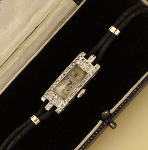 Bonhams : Rolex: A 9ct gold lady's wristwatch, an enamelled fob watch ...