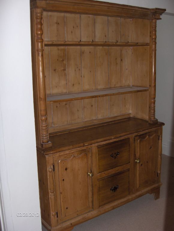 Bonhams : A 19th century pine dresser with delft rack
