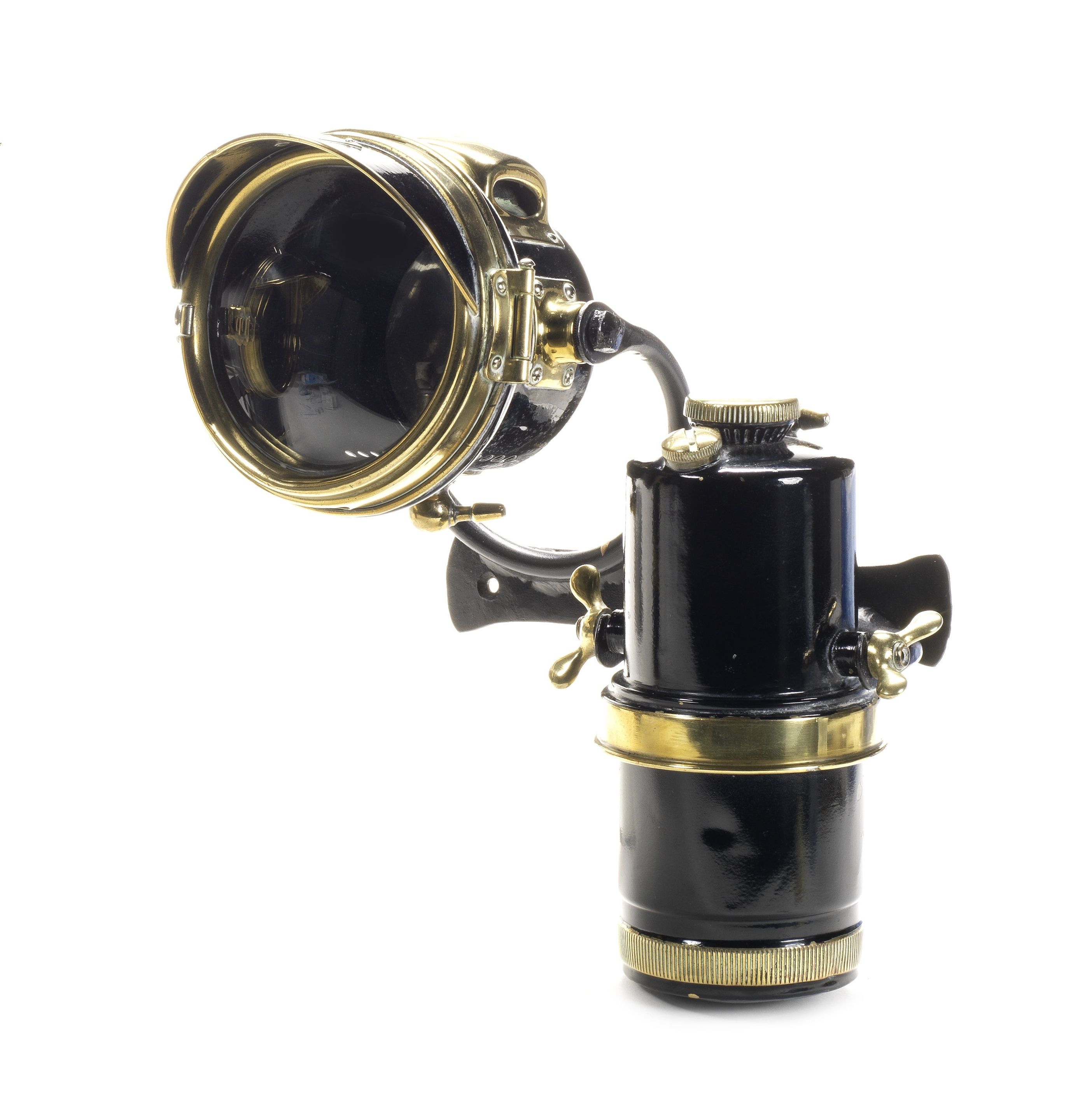 Bonhams Cars : A Miller acetylene headlamp and generator,